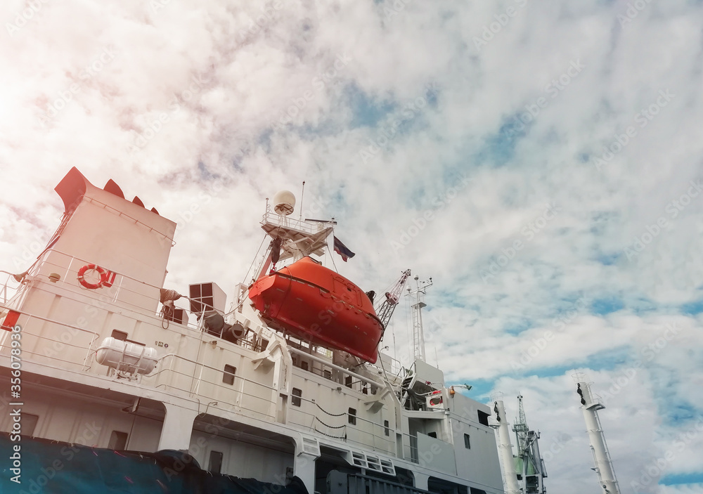 Low angle view of Lifeboat or rescue boat on the side ship during ship ...