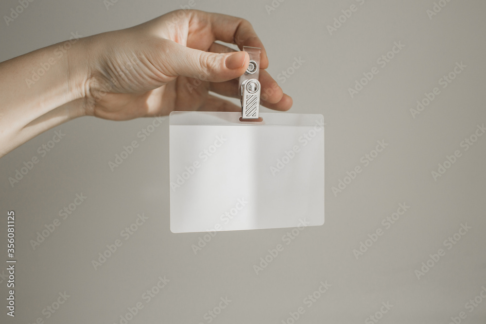 Template of Id Card. The hand holding the plastic Id Card on white wall ...
