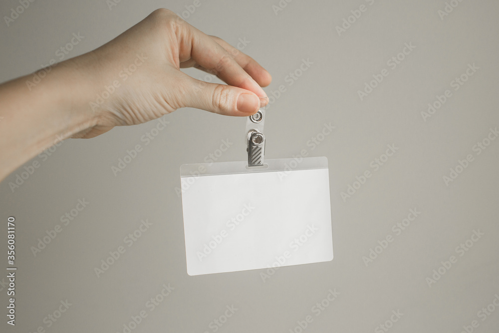 Template of Id Card. The hand holding the plastic Id Card on white wall ...