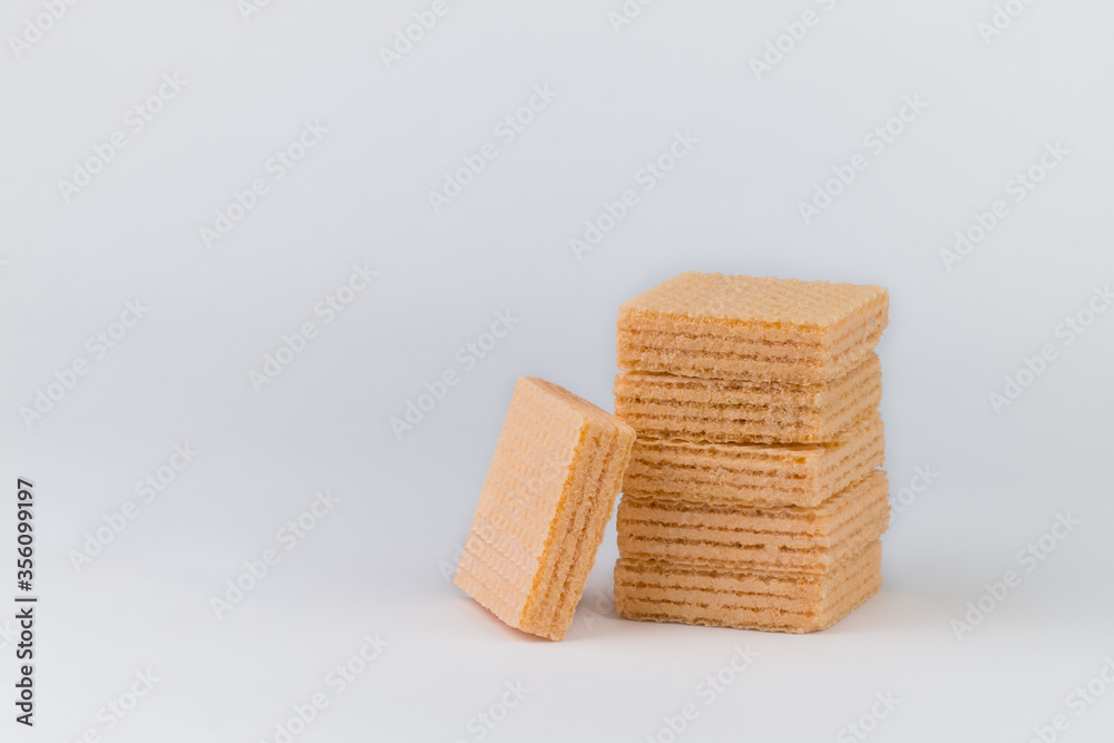 The orange-flavoured wafer Closeup is arranged on top of many pieces ...