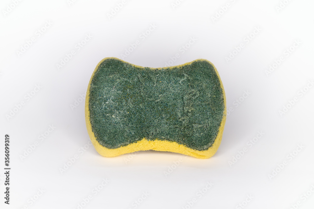 Old sponges for washing dishes and have signs of use. The sponge has ...