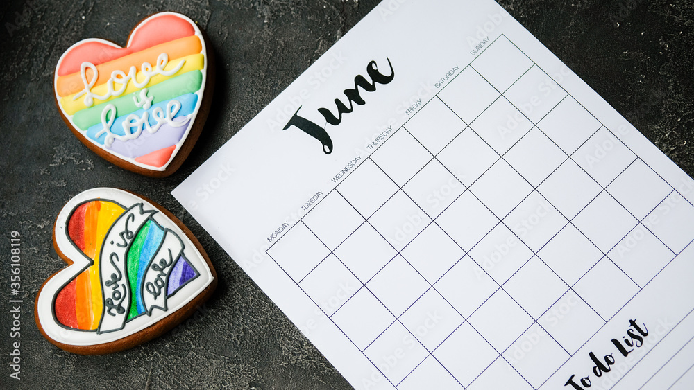 Pride month calendar with LGBT flag cookies. A place for text. Deadline ...