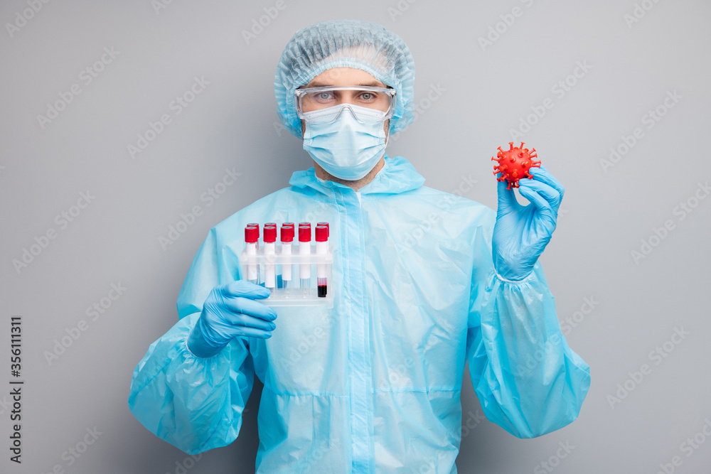 Photo of guy expert doc virologist hold patients blood probe tubes ...
