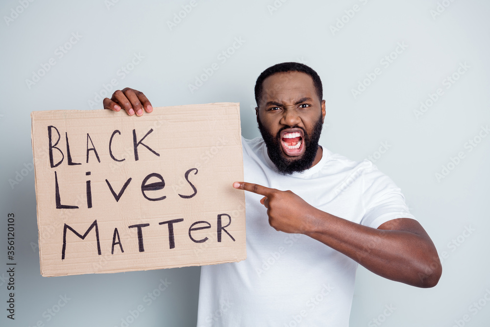 Photo of angry screaming dark skin african guy protest direct finger ...