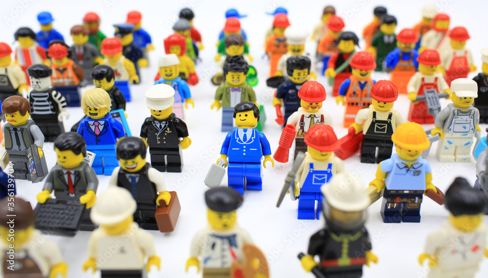 HONG KONG, NOV 2: A group of workers lego mini characters from ...