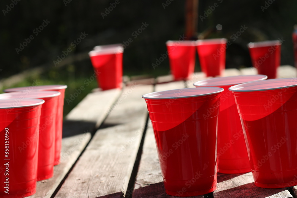 Foto de Red party cups themed background template. White backdrop ...