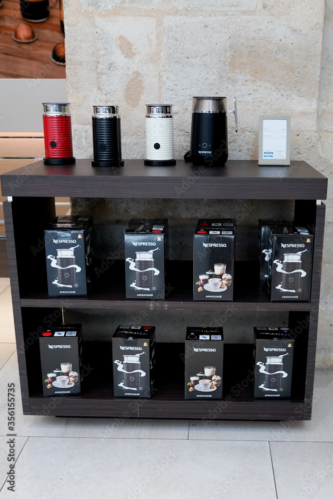 Nespresso logo sign on aeroccino box in shop of coffee machines ...