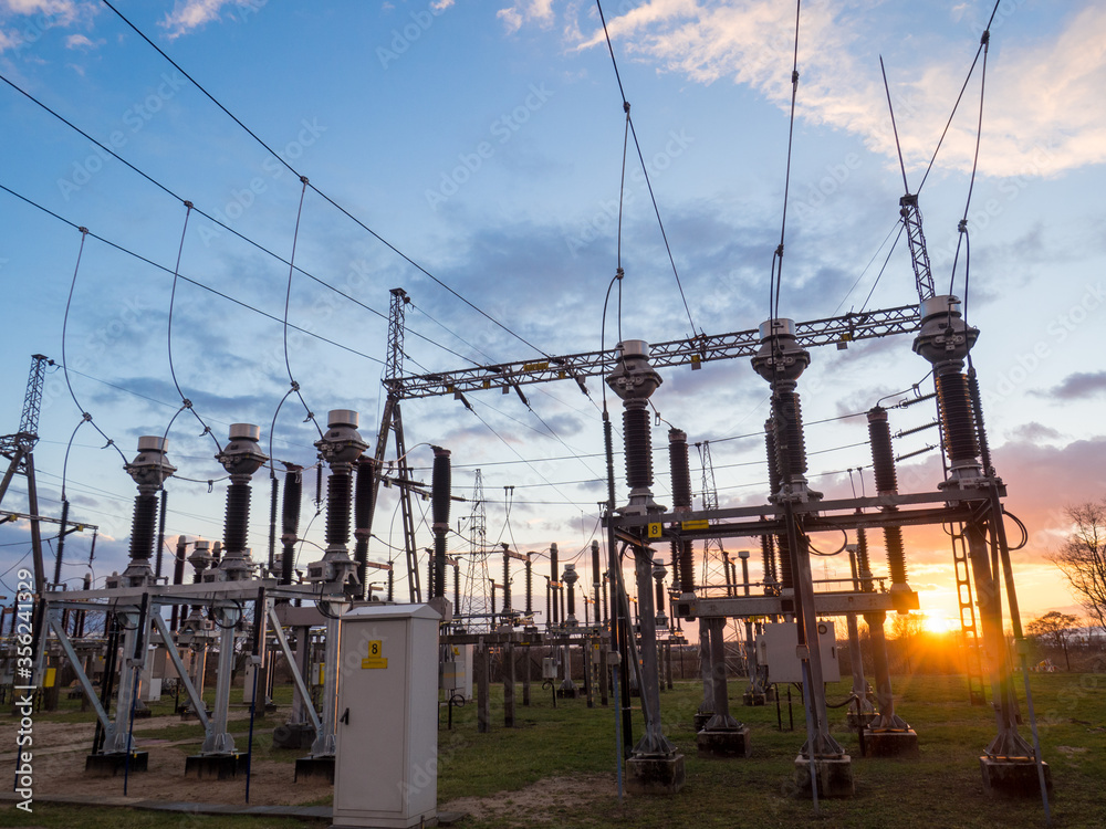 High voltage power substation in the sunset sky Stock Photo | Adobe Stock