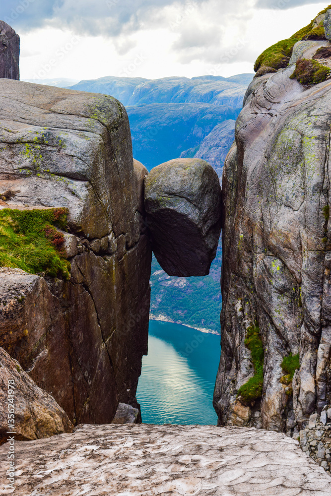 Nobody landscape of the famous Kjeragbolten. The most dangerous stone ...
