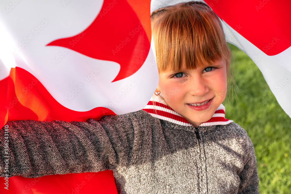 Happy Canada Day Celebration Concept. Pretty cute young caucasian girl ...