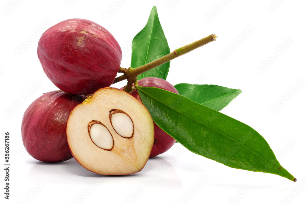Phaleria macrocarpa fruit or God`s crown fruit isolated on white ...