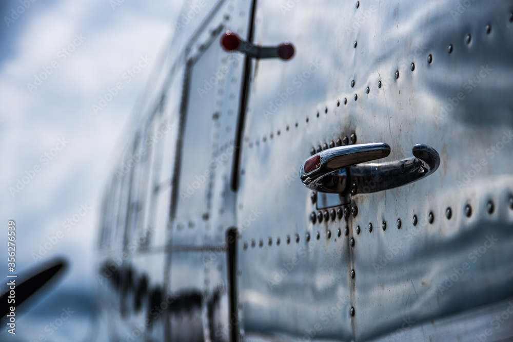 HDR image of the metal skin of a vintage piston propeller airliner ...