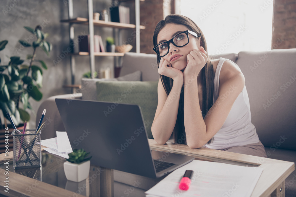 Portrait of tired sad lonely solitude girl high school student sit ...