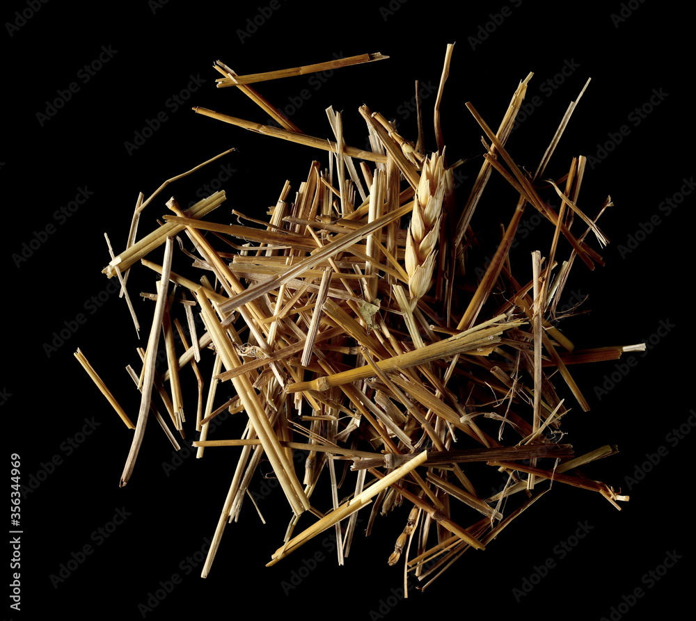 Straw, thatch, hay pile isolated on black background and texture, top ...