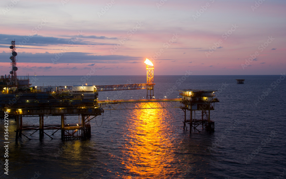 Flare and offshore oil platform Stock Photo | Adobe Stock