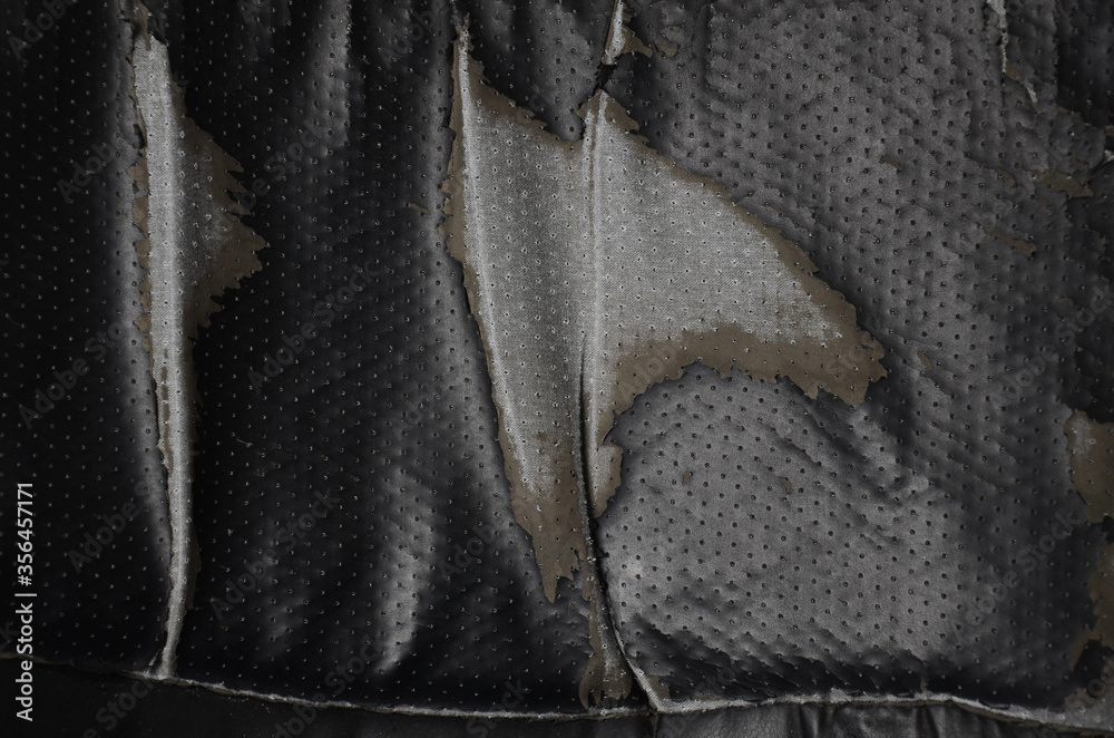 Torn black leather seat included sponge inside. Upholstery, ripped and ...