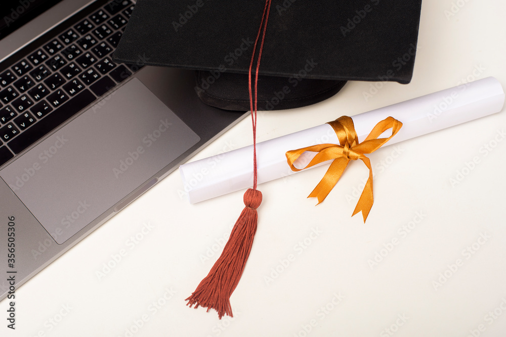 Graduation cap with laptop computer , Online education concept Stock ...