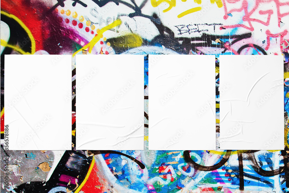 Closeup of colorful messy painted urban wall texture with four wrinkled ...