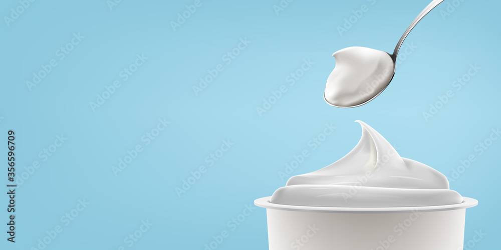 ภาพประกอบสต็อก Natural greek yogurt in the spoon on blue background ...