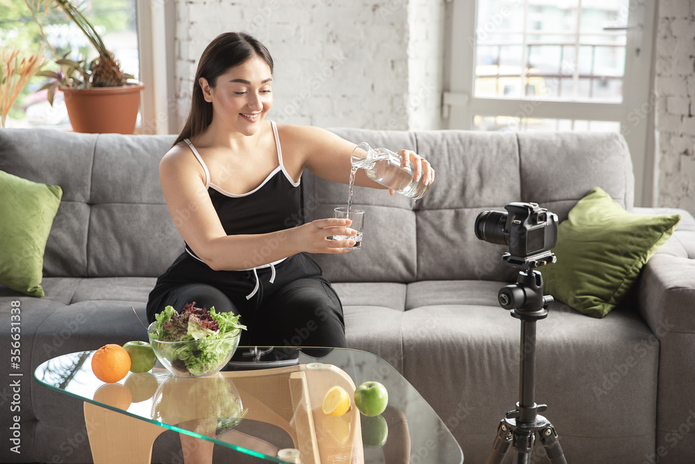 Organic. Caucasian blogger, woman make vlog how to diet and lost weight ...