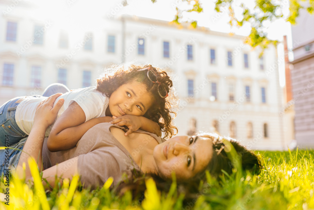 Happy and friendly family in nature. Emotional and beautiful young ...