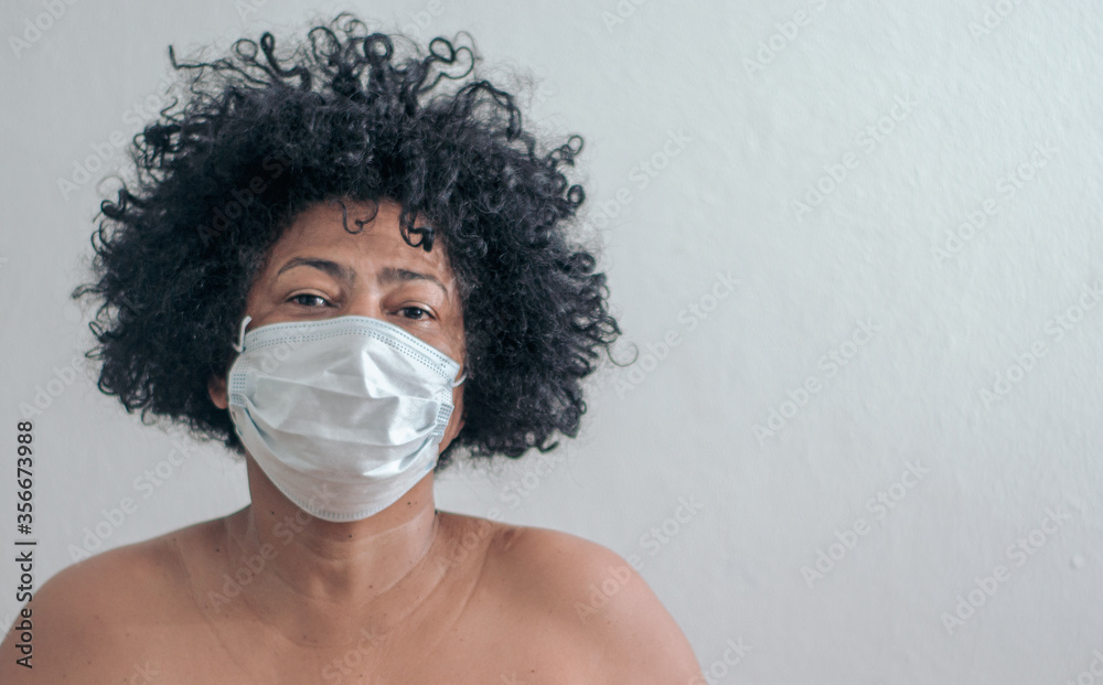 portrait dominican adult woman with dark skin with curly hair with mask ...