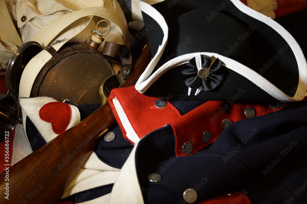 Revolutionary War uniform, hat, musket and artifacts Stock Photo ...