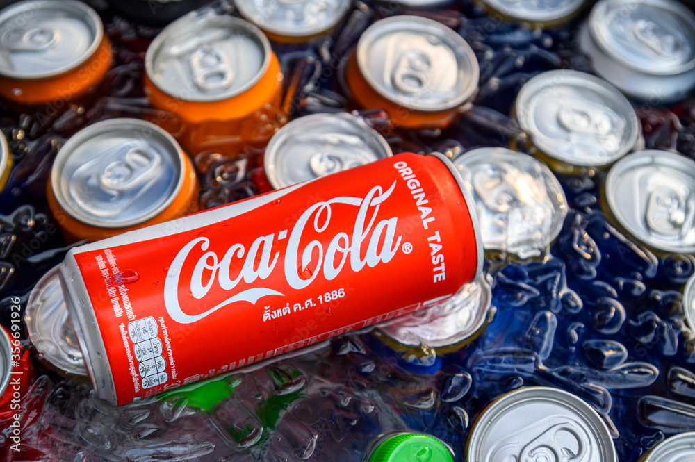 coca-cola can and ice soft drink cans on ice bucket. Stock Photo ...