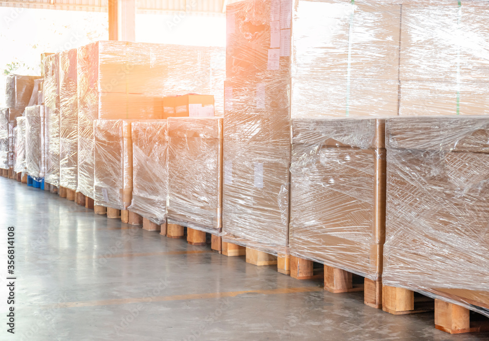 Packaging Boxes Stacked on Pallets in Storage Warehouse. Cartons ...