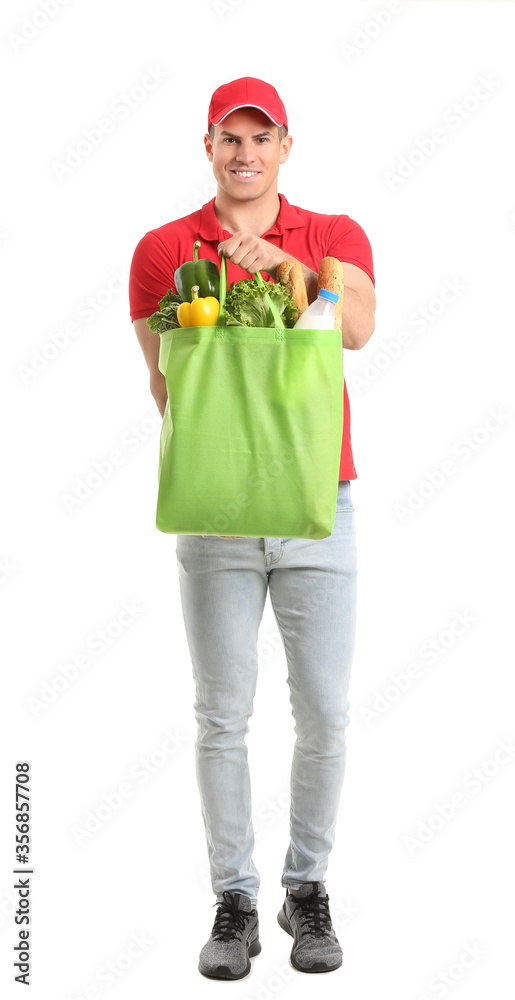 Delivery man with food in bag on white background Stock Photo | Adobe Stock