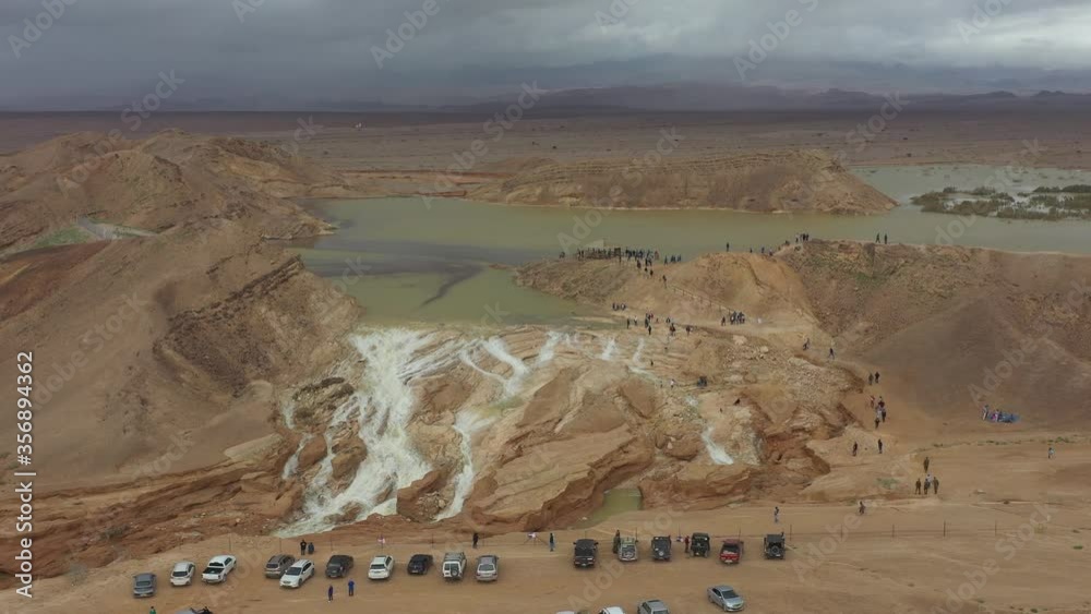 Flash Flood in the desert Waterfall- Aerial Footage Swifts flying ...