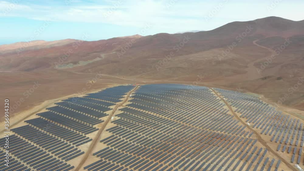 Aerial footage. Reverse flight of a Solar Energy Farm at Atacama Desert ...