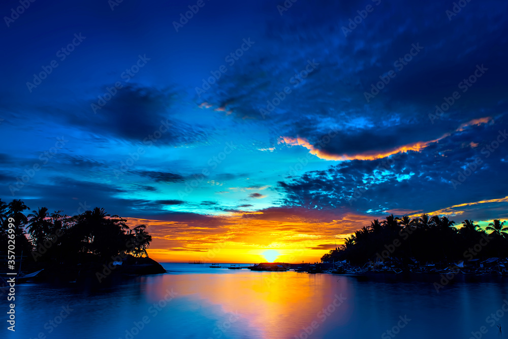 Sunset before an typhoon makes the sky explode with colors at Malandog ...