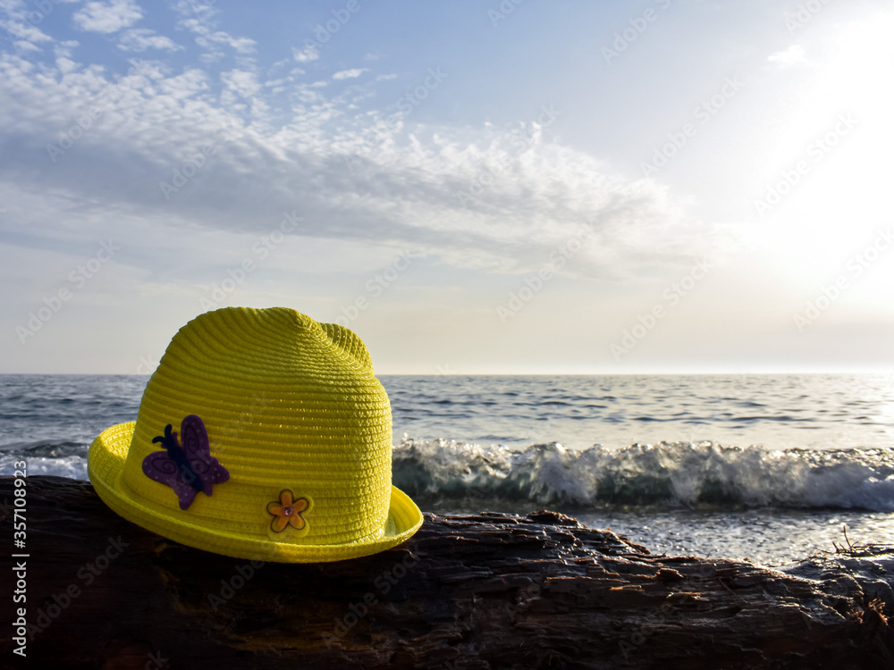 Summer hat on the beach. Safety rules for being in the water. Stock ...