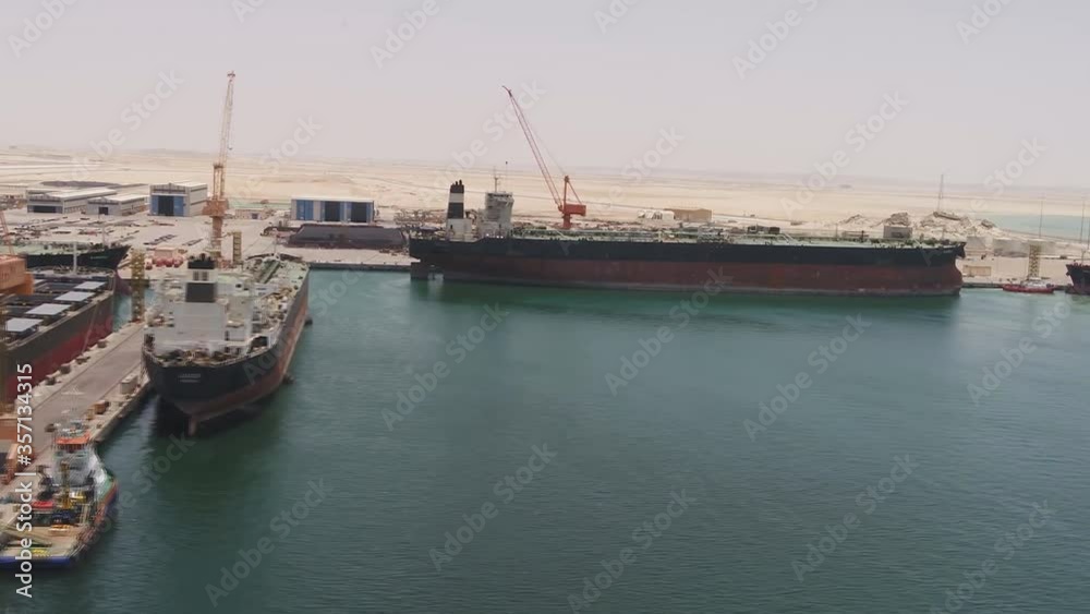 Aerial view of a shipyard in Oman. Oman Drydock Company (ODC) is one of ...