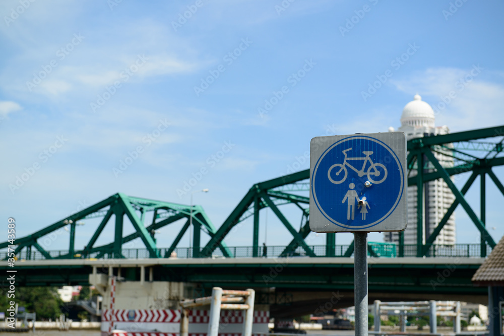 White color adult and children pedestrian and bicycle symbols on the ...