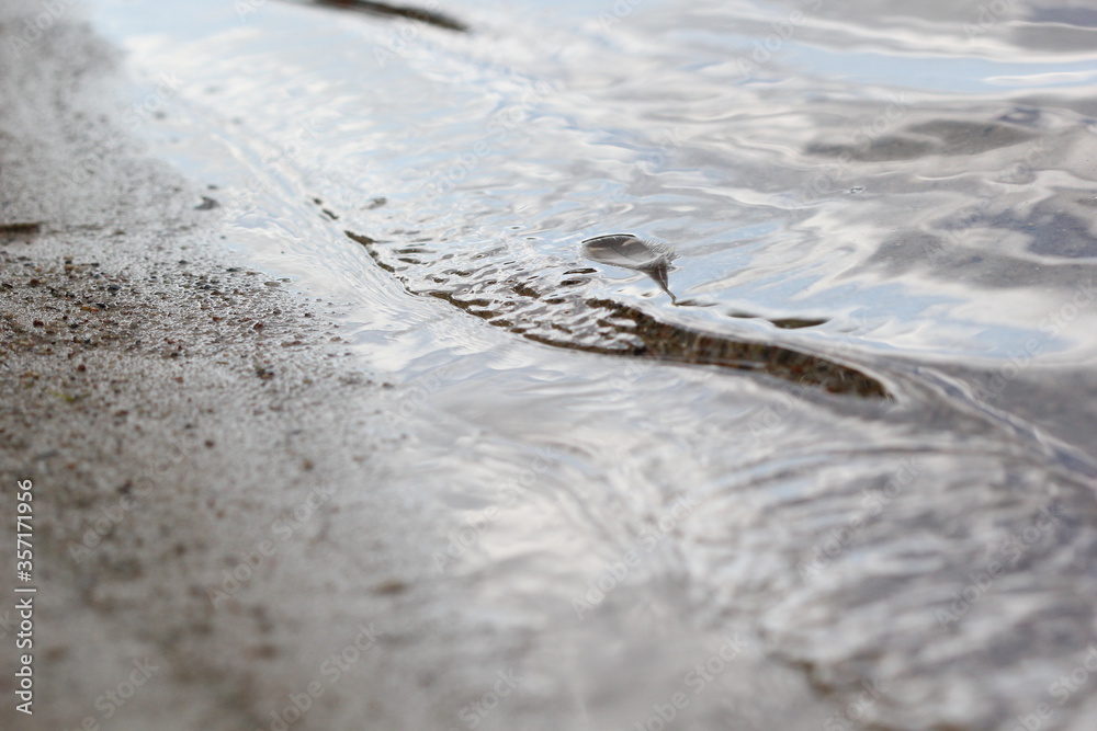 sand and water beach Stock Photo | Adobe Stock
