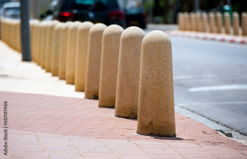 concrete column safety barrier on a city street Stock Photo | Adobe Stock