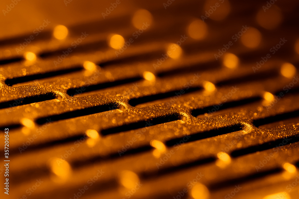 Texture in a rough plastic surface. Shiny metallic in brown and gold ...