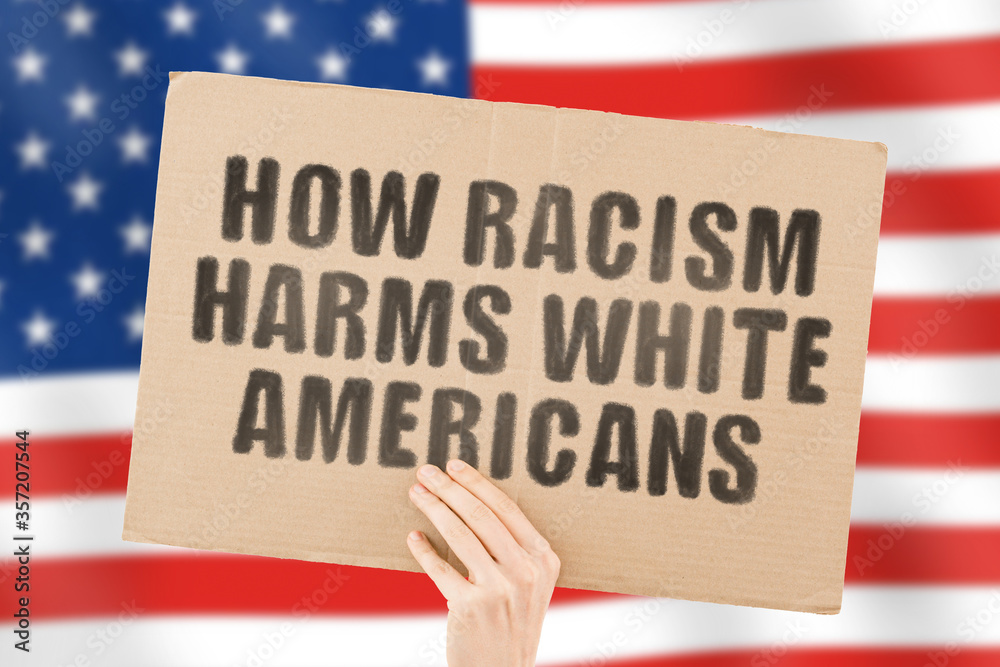 The phrase " How racism harms white Americans " on a banner in men's ...