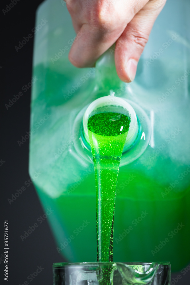 liquid soap in plastic bottle, pouring by hand Stock Photo | Adobe Stock