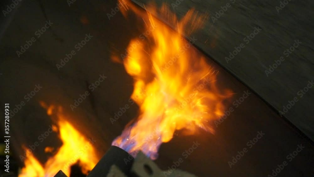 Close up of firing process in the hot shop of the factory. Stock ...