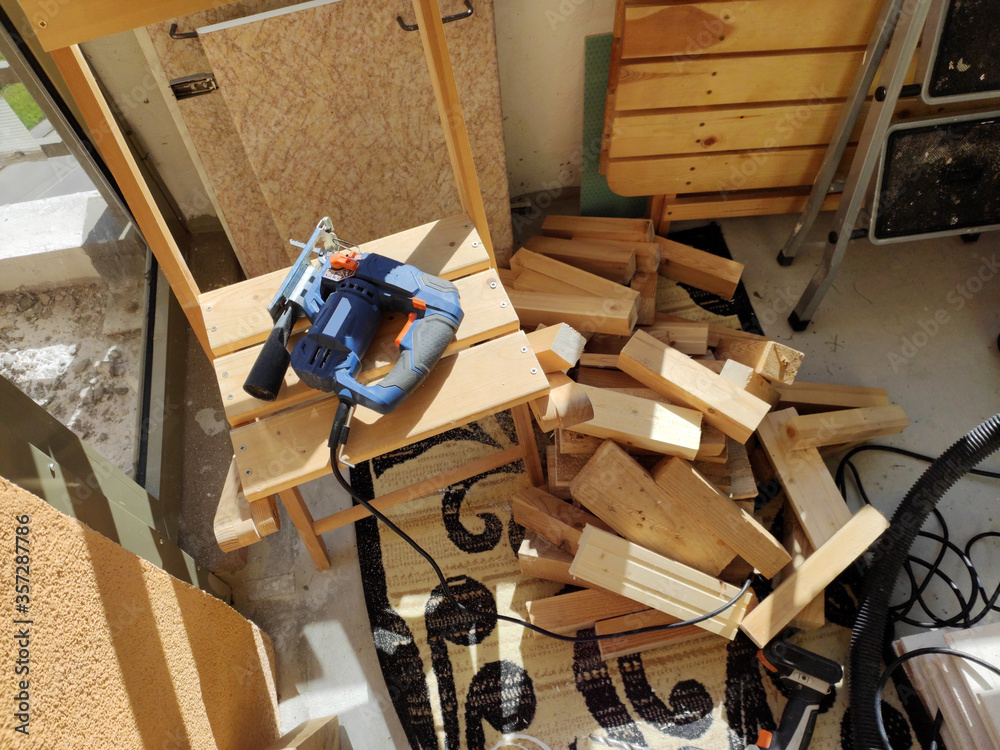 Lumber. Firewood. Building materials for construction on the floor ...
