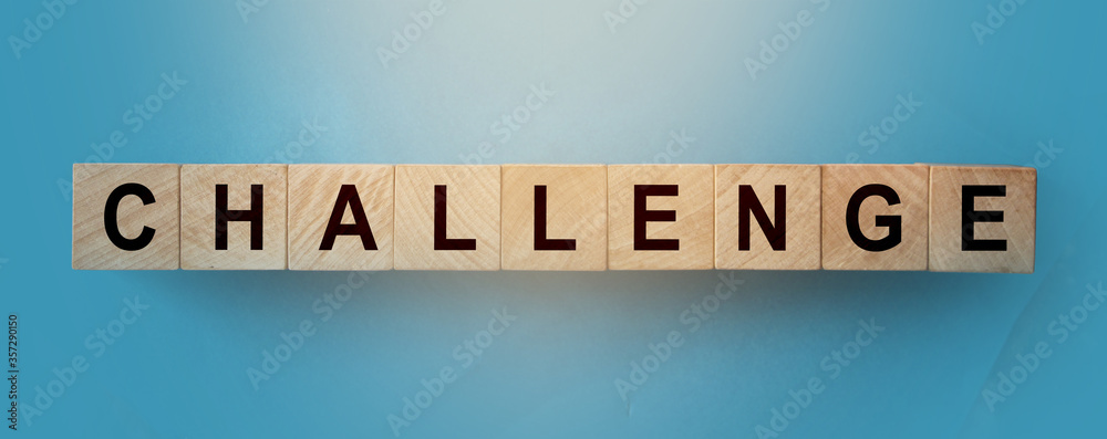 Challenge word made with wooden blocks. Ambitious career achievements ...