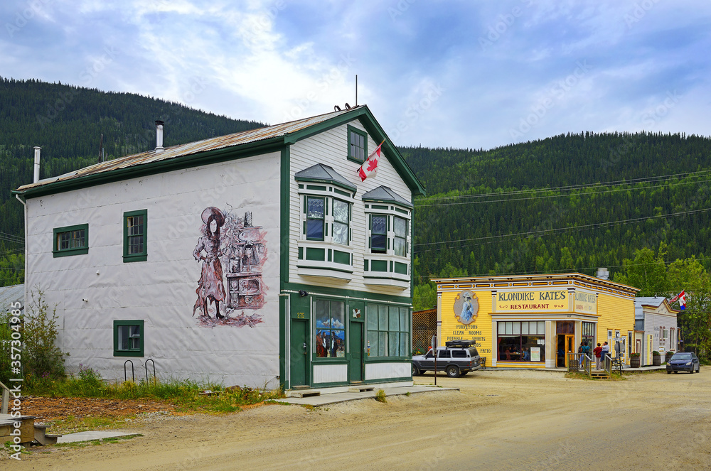 Historic building and traditional wooden building in Dawson City, Yukon ...
