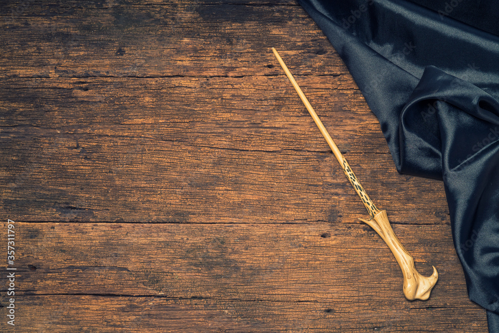 Magic wand on wooden table, Magic wand Wizard tool on vintage wooden ...