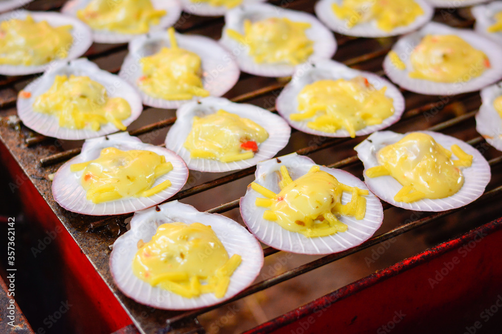 BBQ grilled scallops on fire, grilled scallops with butter and cheese ...