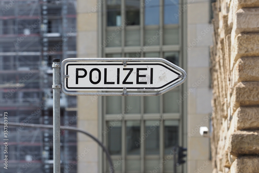 Signpost of the German police station or polizei in Hamburg, Germany ...