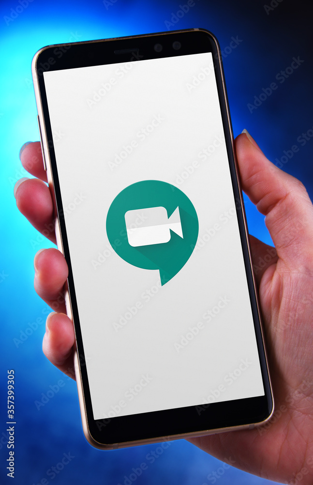 Hand holding smartphone displaying logo of Google Meet Stock Photo ...