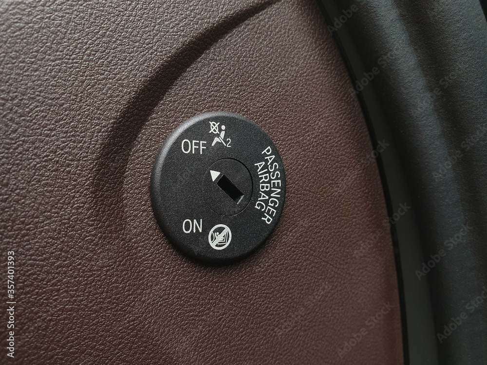 Airbag deactivation lock close up. Lock disconnect in off position ...